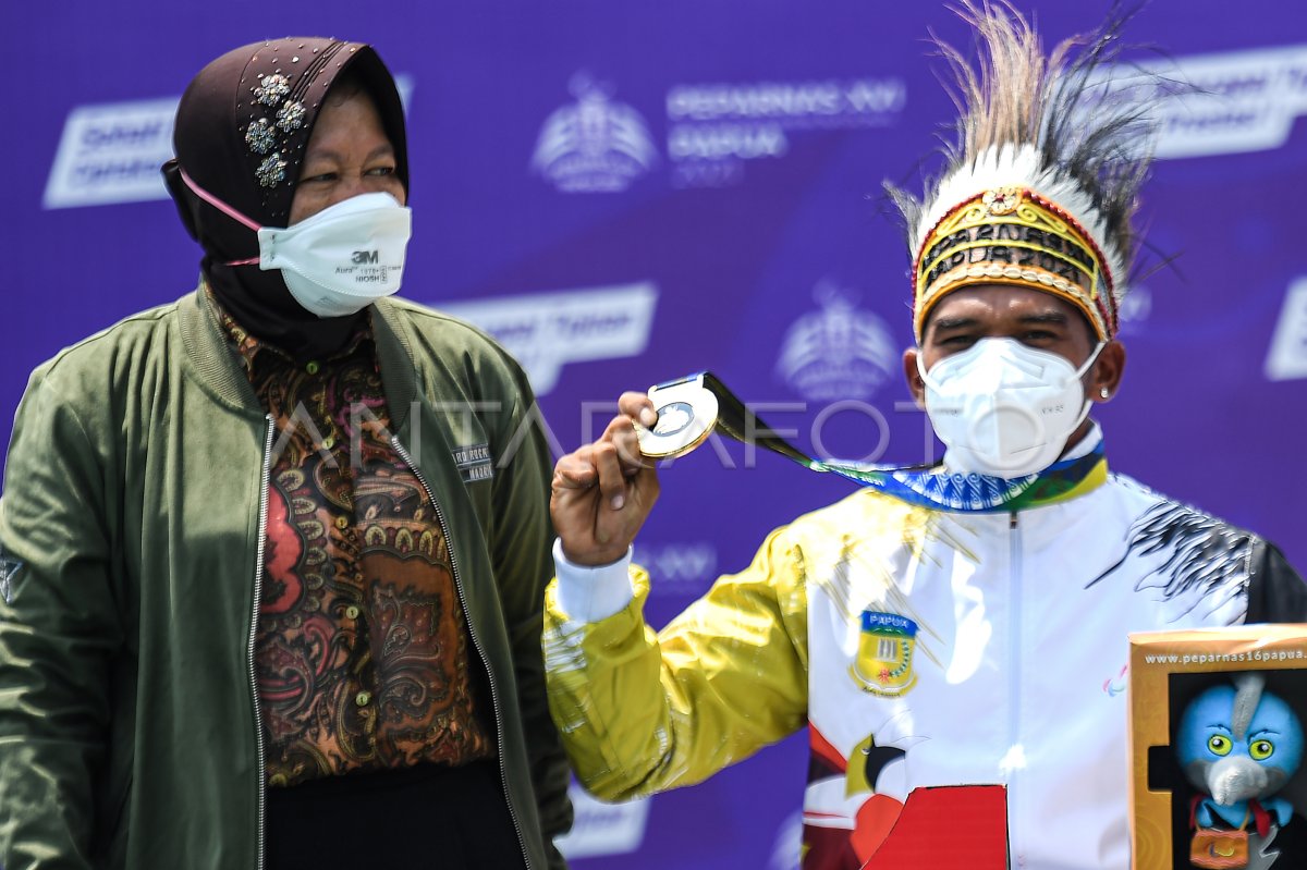 PAPUA RAIH EMAS TENIS ELIT PEPARNAS | ANTARA Foto