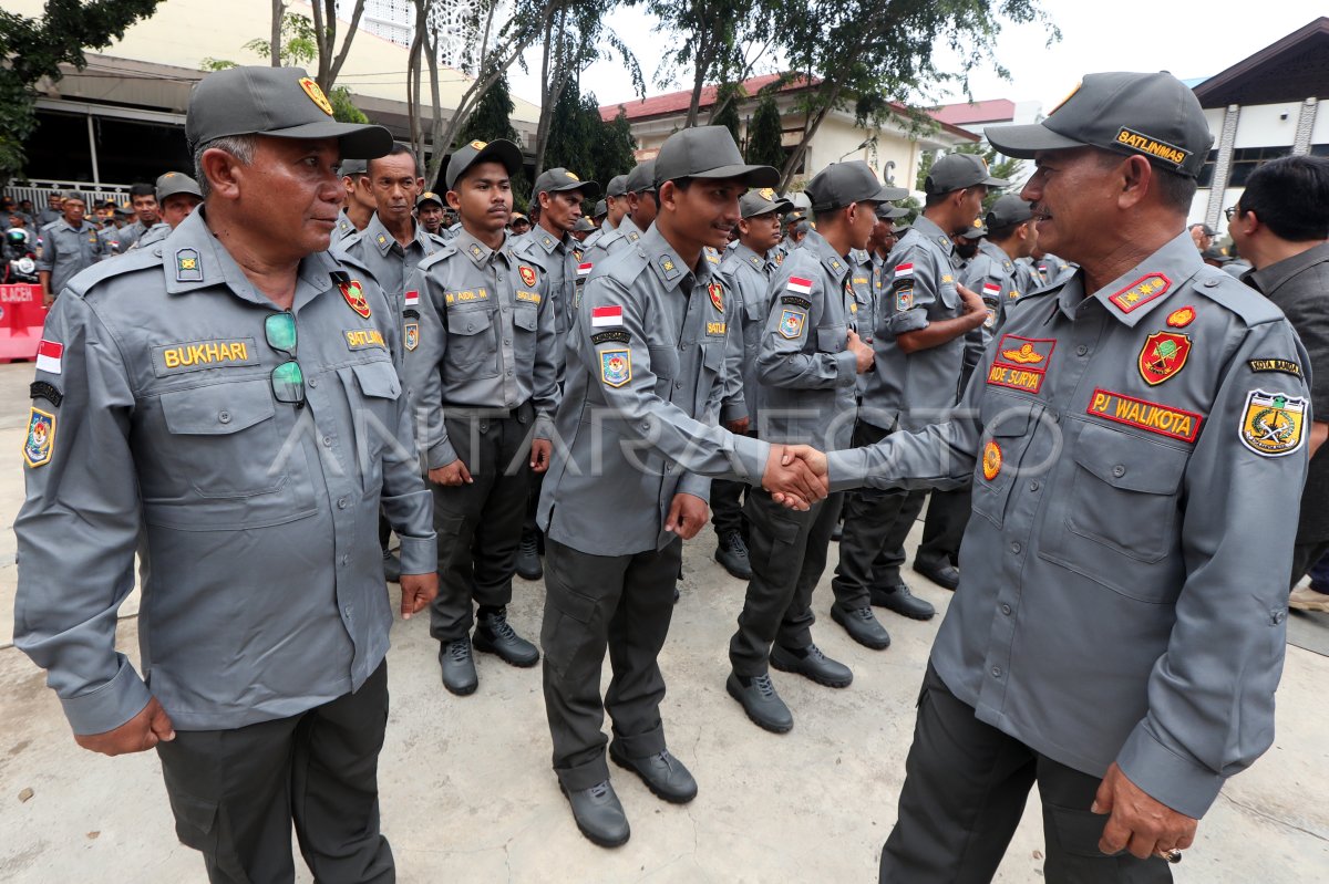 Apel Satlinmas TPS untuk pengamanan pilkada di Aceh | ANTARA Foto