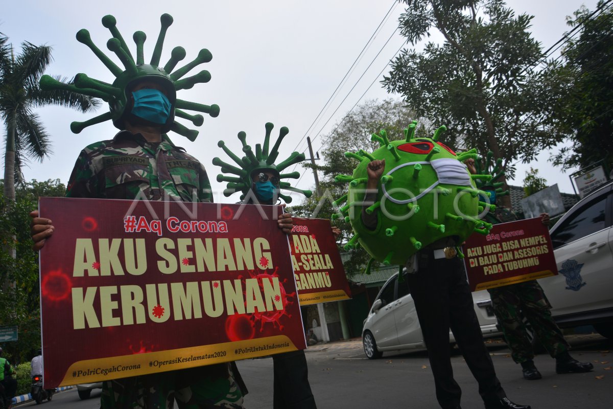SOSIALISASI PENGGUNAAN MASKER CEGAH COVID-19 | ANTARA Foto