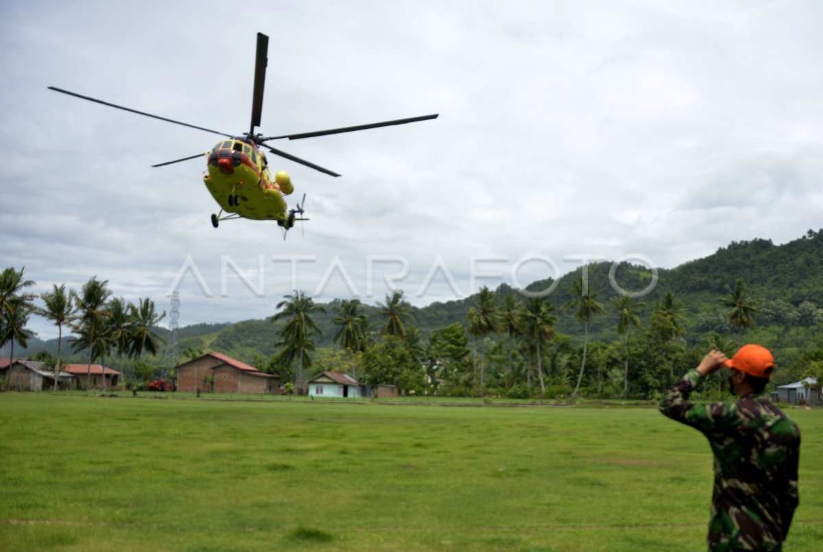 DISTRIBUSI BANTUAN LOGISTIK DENGAN HELIKOPTER | ANTARA Foto DISTRIBUSI BANTUAN LOGISTIK DENGAN HELIKOPTER | ANTARA Foto
